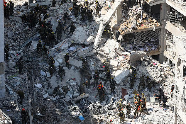 As sirens wail I text a friend. She tells me a missile has just killed seven... it could've been us