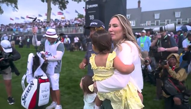 US Open winner JJ Spaun fights back tears as he celebrates with wife ...