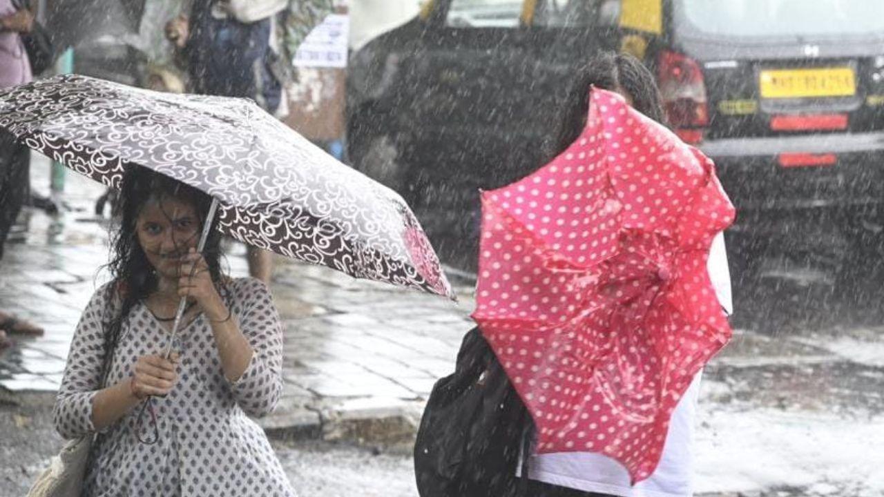 IN PHOTOS Mumbai Heavy rain lashes Marine Drive strong winds sweep ...