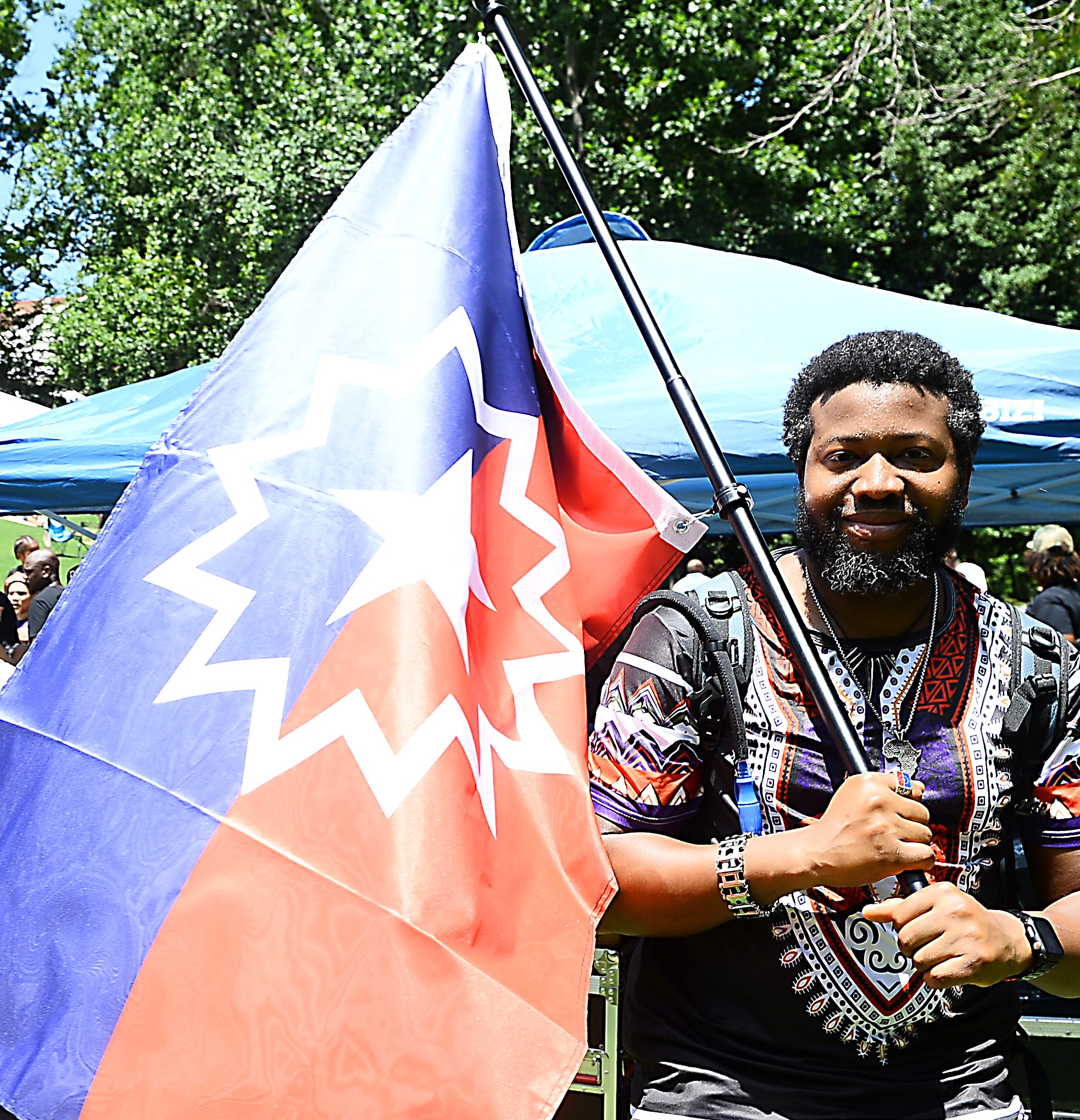 What does the red, white and blue Juneteenth flag represent?