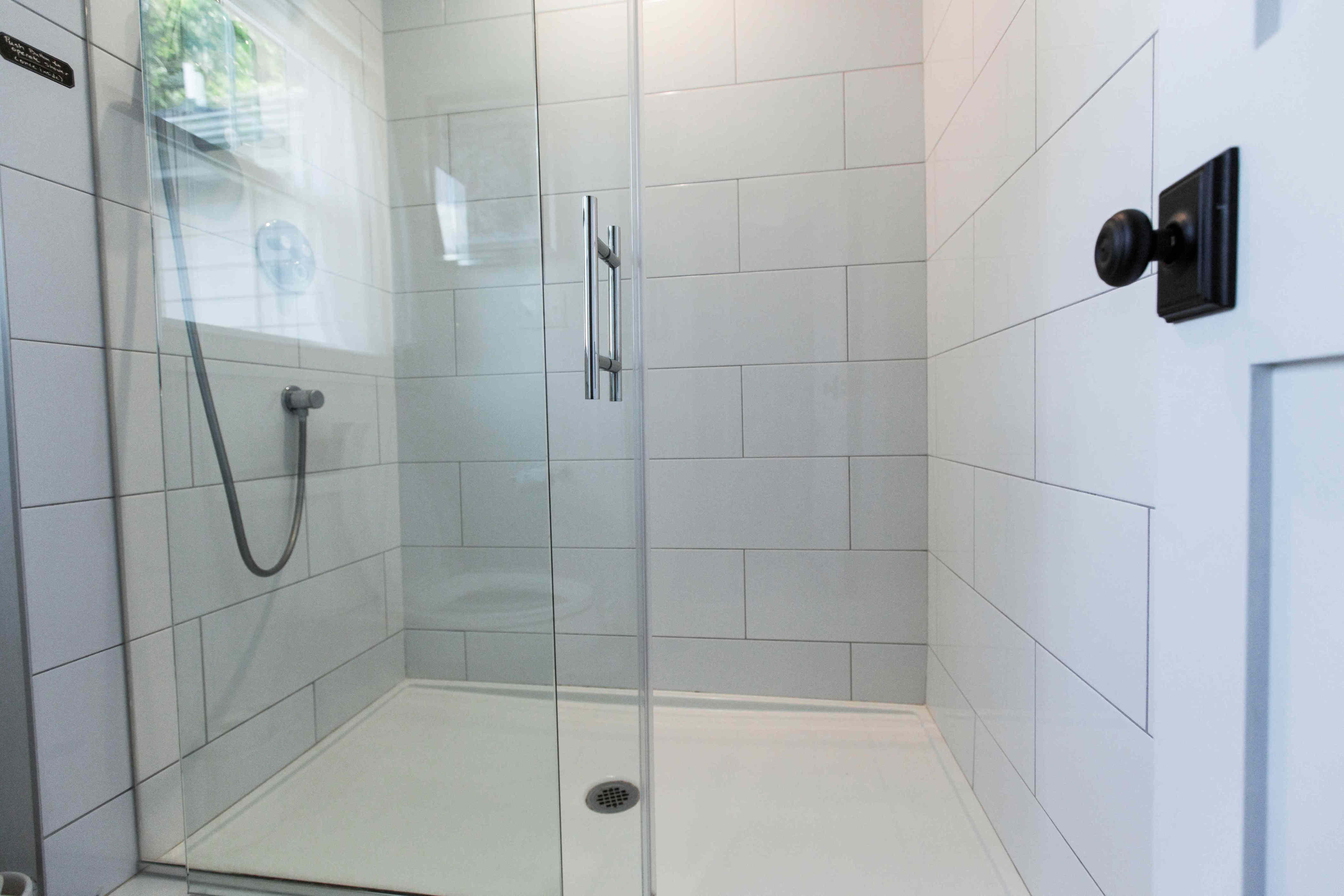 My glass shower doors are crystal clear—here’s the $11 hack that keeps ...