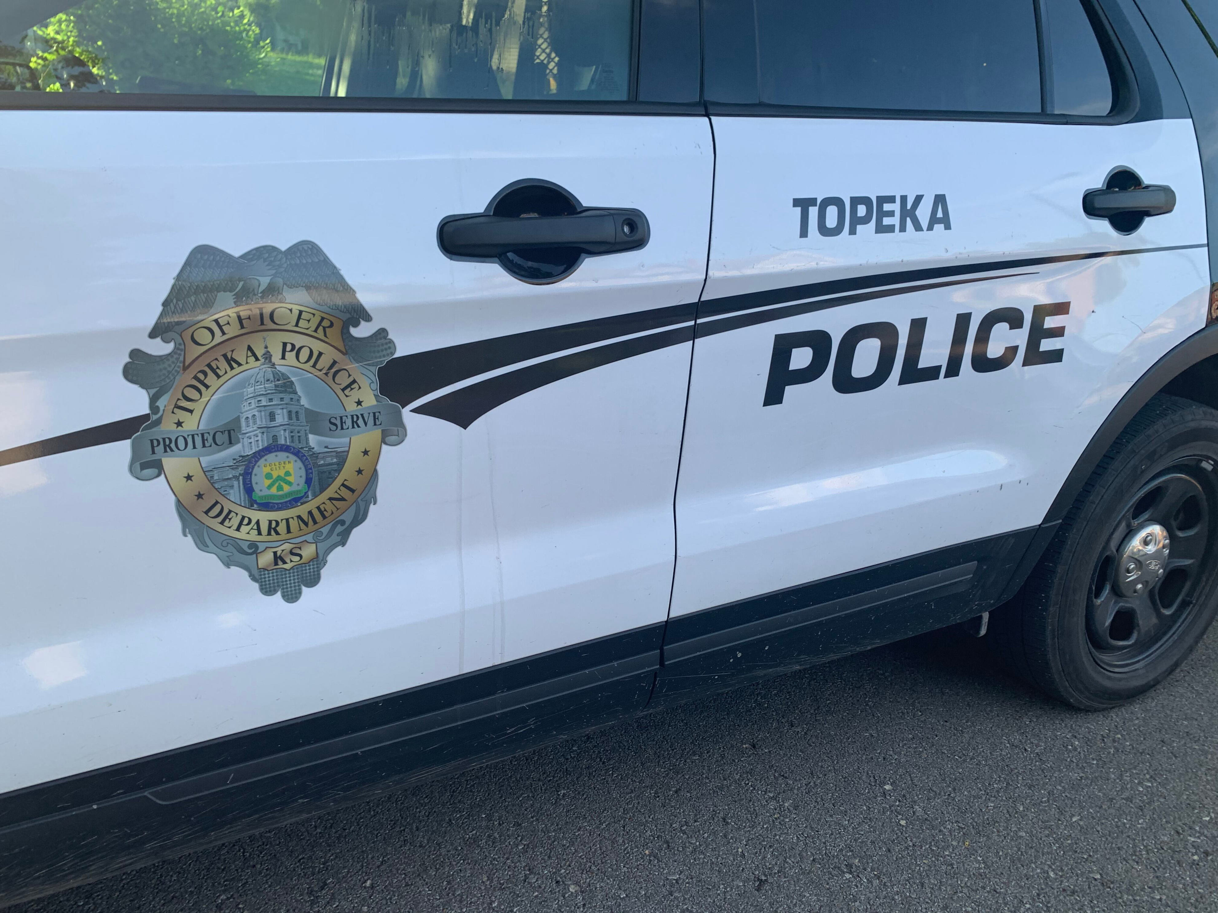 Topeka police car struck by suspected impaired driver, officials say