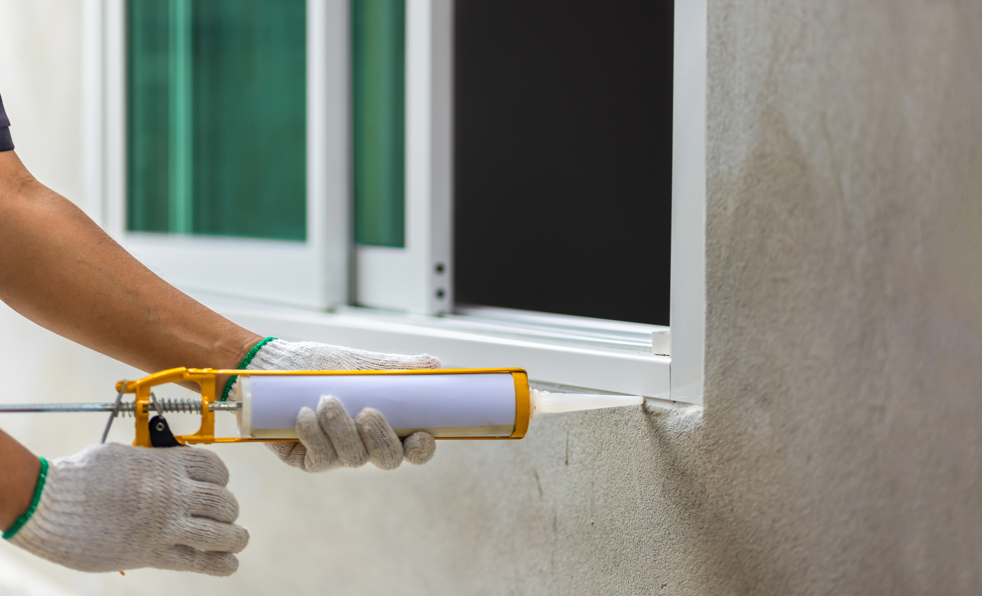 Caulking spots preventing drafts and leaks