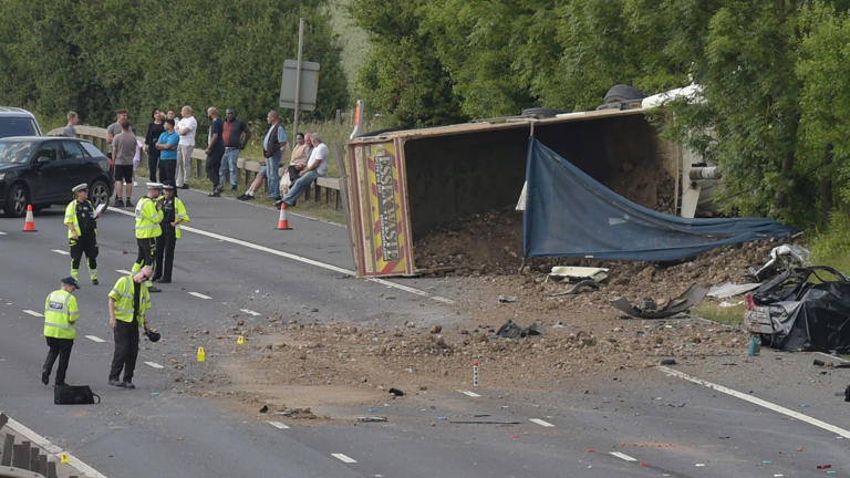 Man, 21, dies in M11 crash as lorry driver arrested