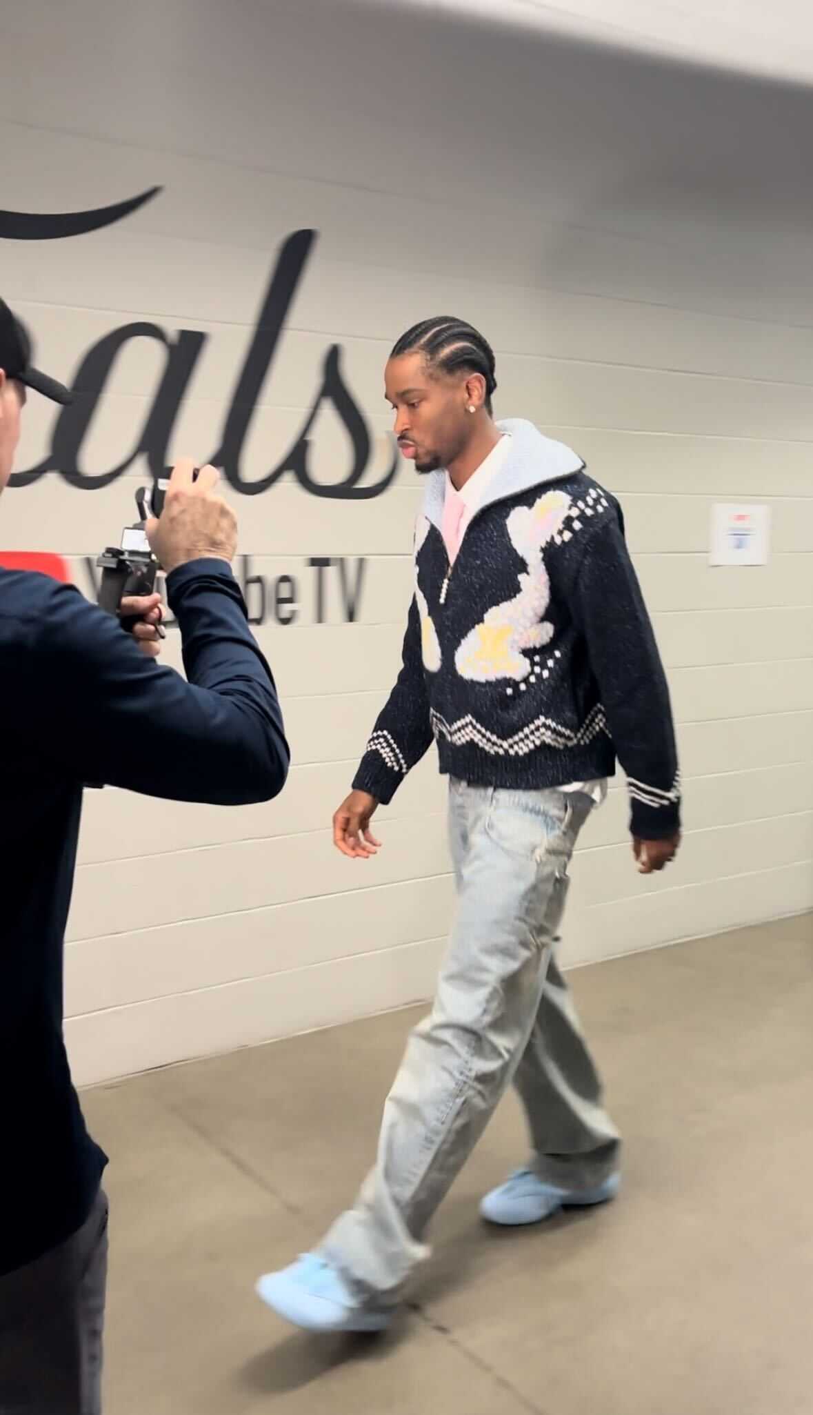 Finals Fashion: Thunder players walk through tunnel ahead of Game 5 of ...