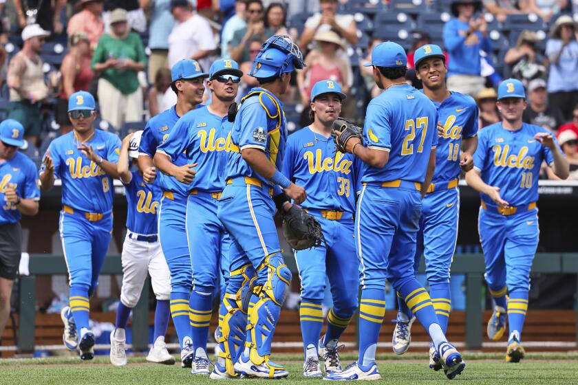 UCLA versus LSU Men's College World Series game suspended until Tuesday