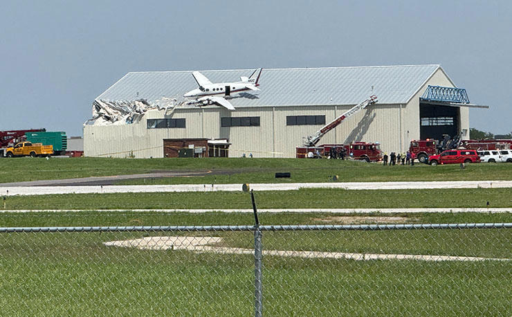Two injured after small plane crashes into hangar at Johnson County airport