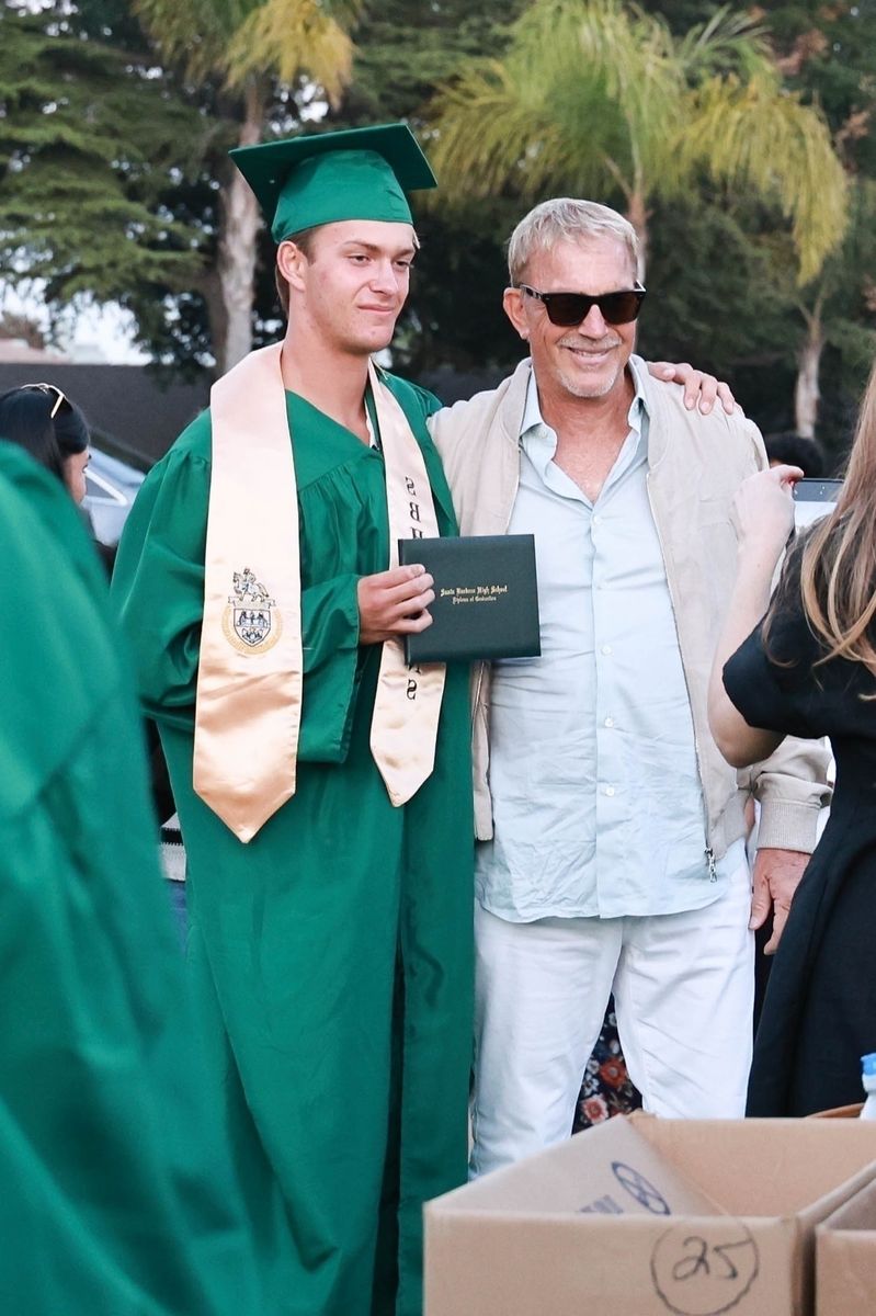 Kevin Costner and Christine Baumgartner reunite but keep their distance