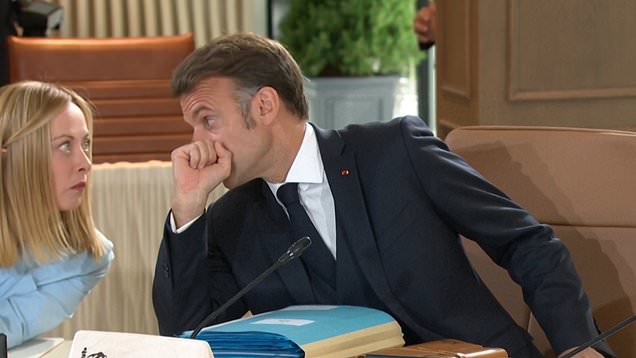 Slouching Meloni rolls her eyes as Macron whispers into her ear