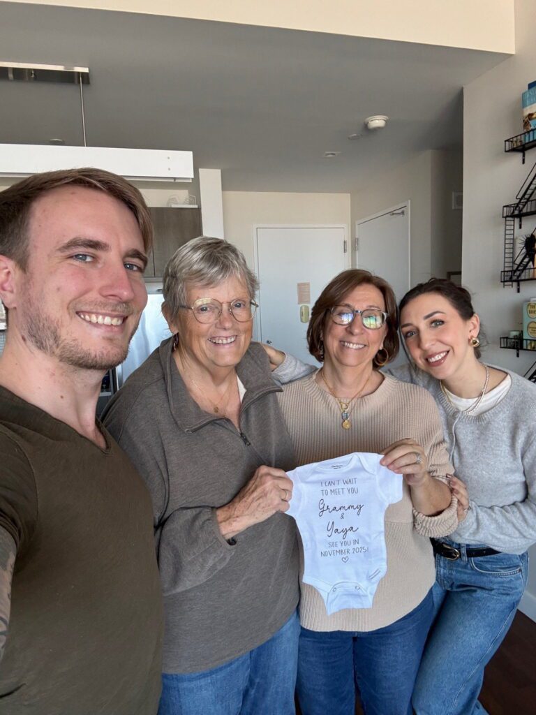 Daughter surprises her two mums with pregnancy reveal for Pride Month