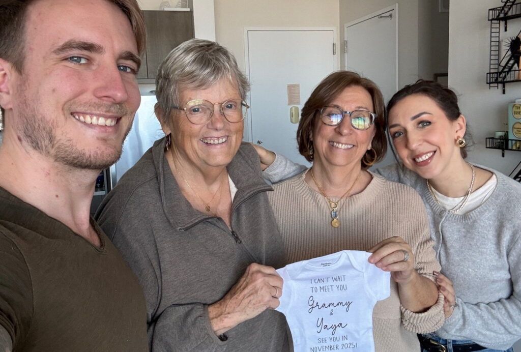 Daughter surprises her two mums with pregnancy reveal for Pride Month