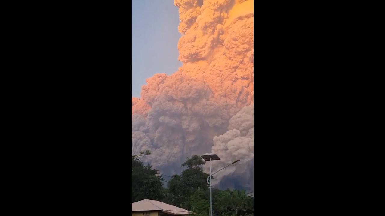 Ash cloud towers over homes as Mount Lewotobi volcano erupts