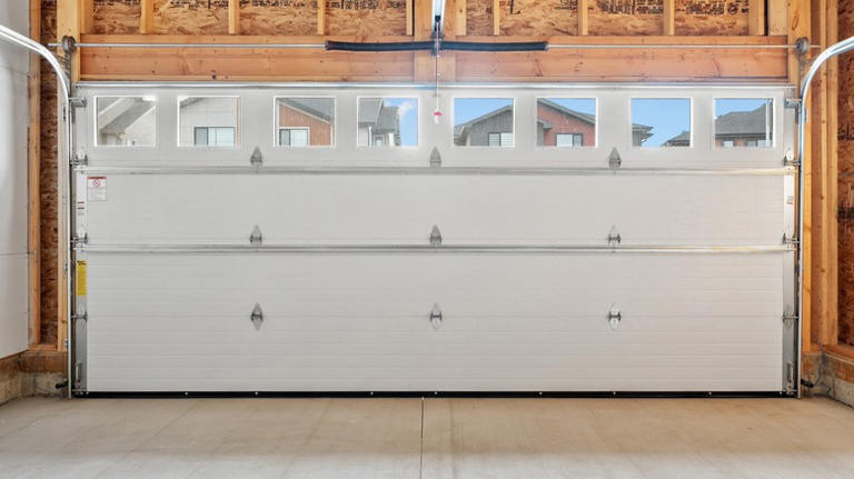 No, You Shouldn't Grease Your Garage Door's Track - Here's What To Do ...
