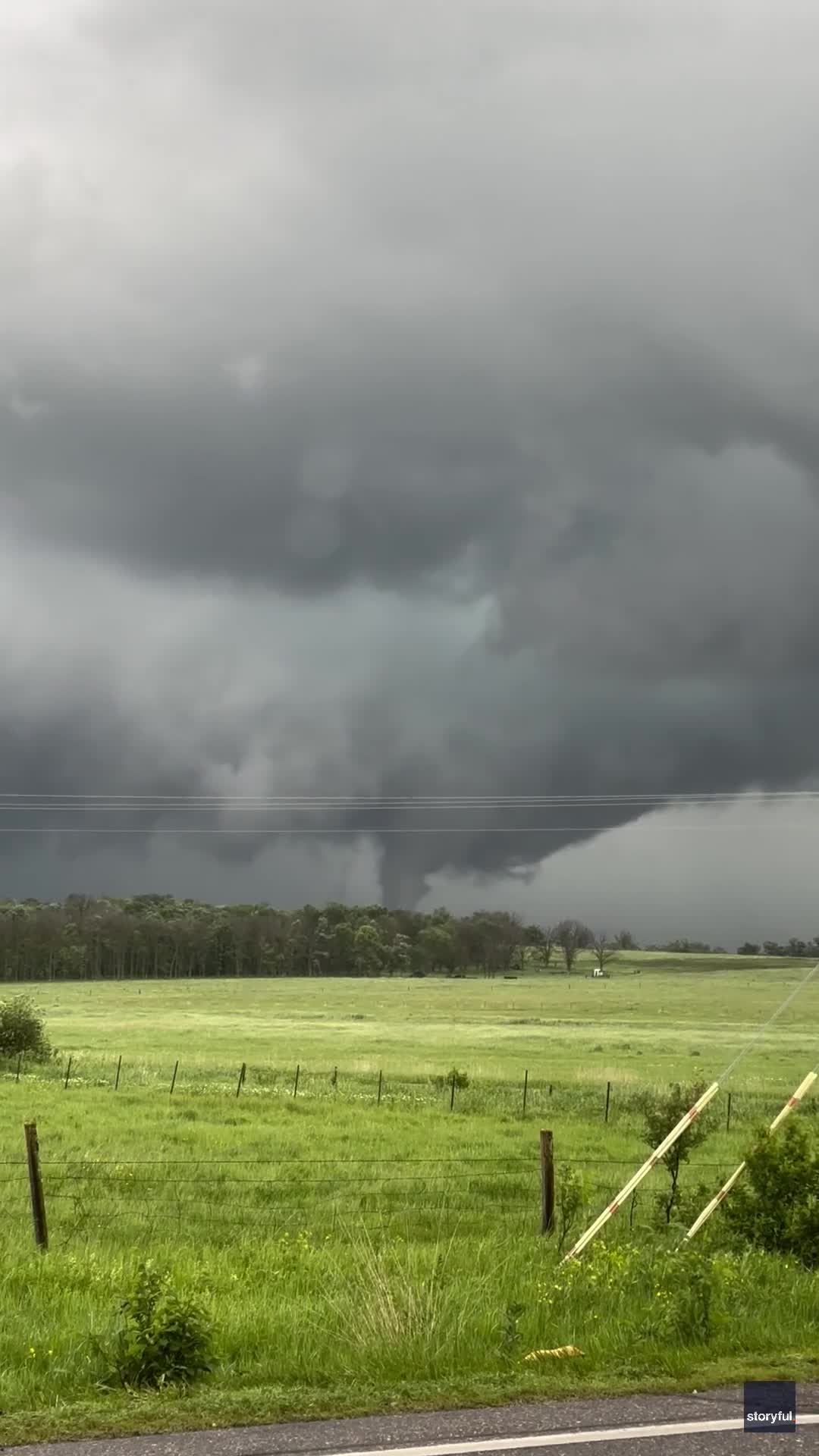 Intense Funnel Cloud Sweeps Across Farmland During Tornado-Warned Storm ...