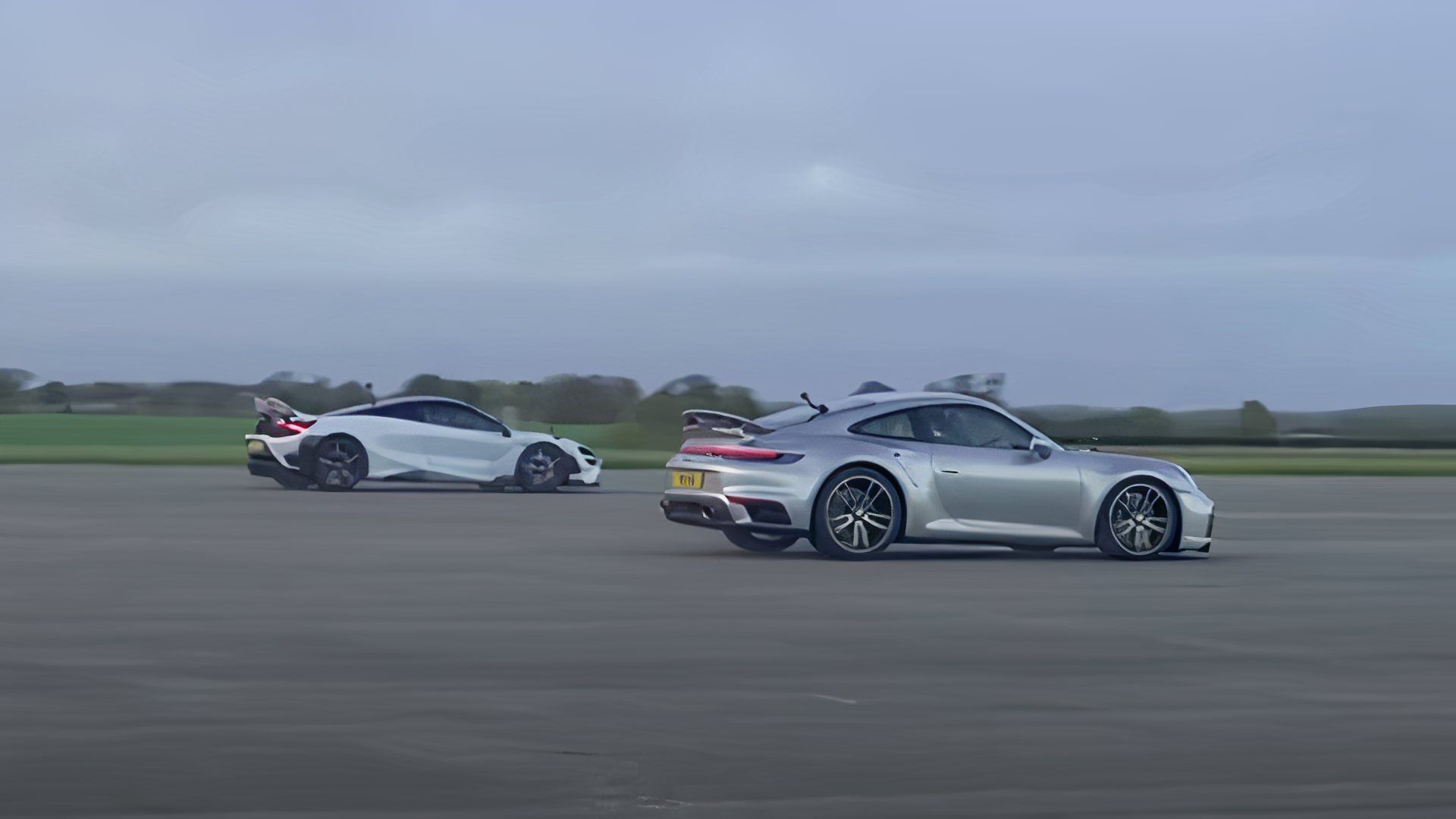 Watch The Porsche 911 Turbo S Take On The McLaren 765LT In This Drag ...