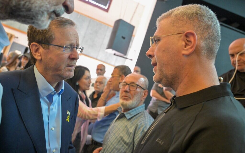 Herzog visits relatives of 4 killed in Iranian ballistic missile strike ...