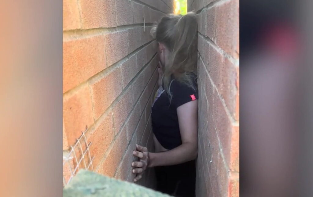Woman squeezes through 5.5-inch gap to rescue trapped kittens