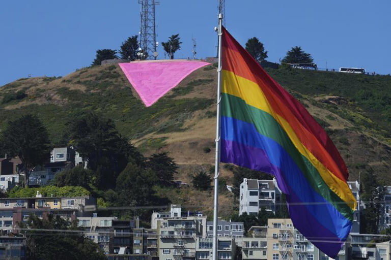 S.F.'s Pink Triangle, symbol of LGBTQ+ rights and Nazi persecution, is ...