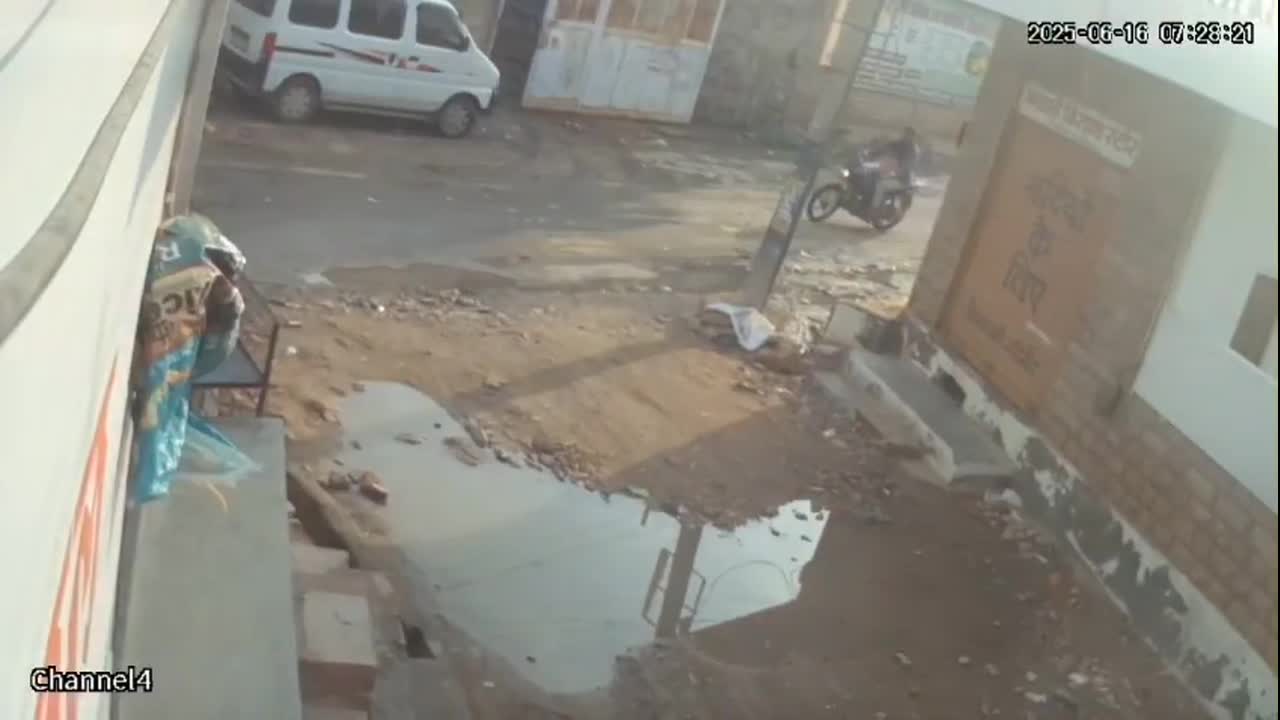 Wild boar knocks over motorcycle rider and attacks them in India