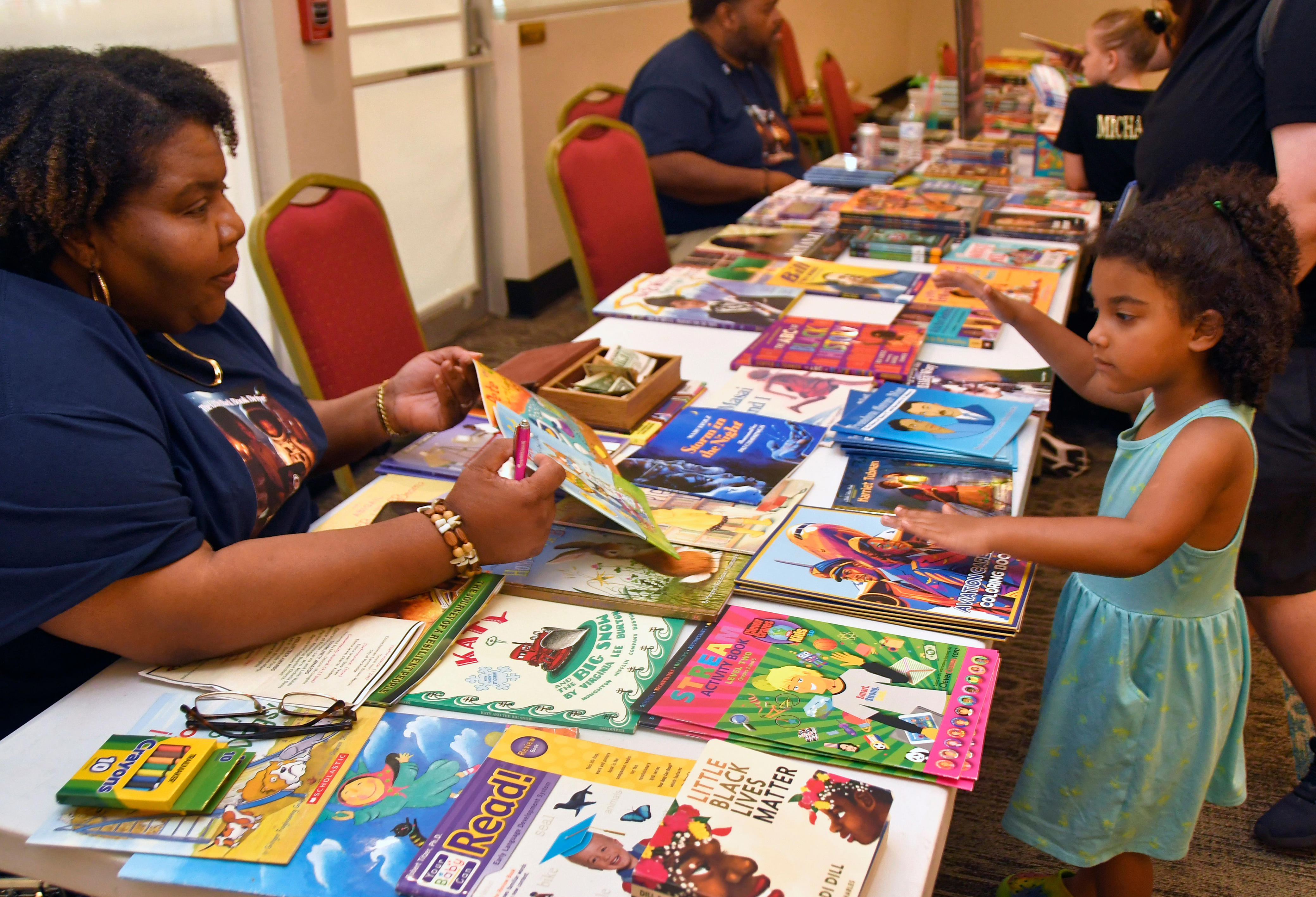 'It's your story, too!' Little Black Book Drive aims to inspire Brevard kids through stories