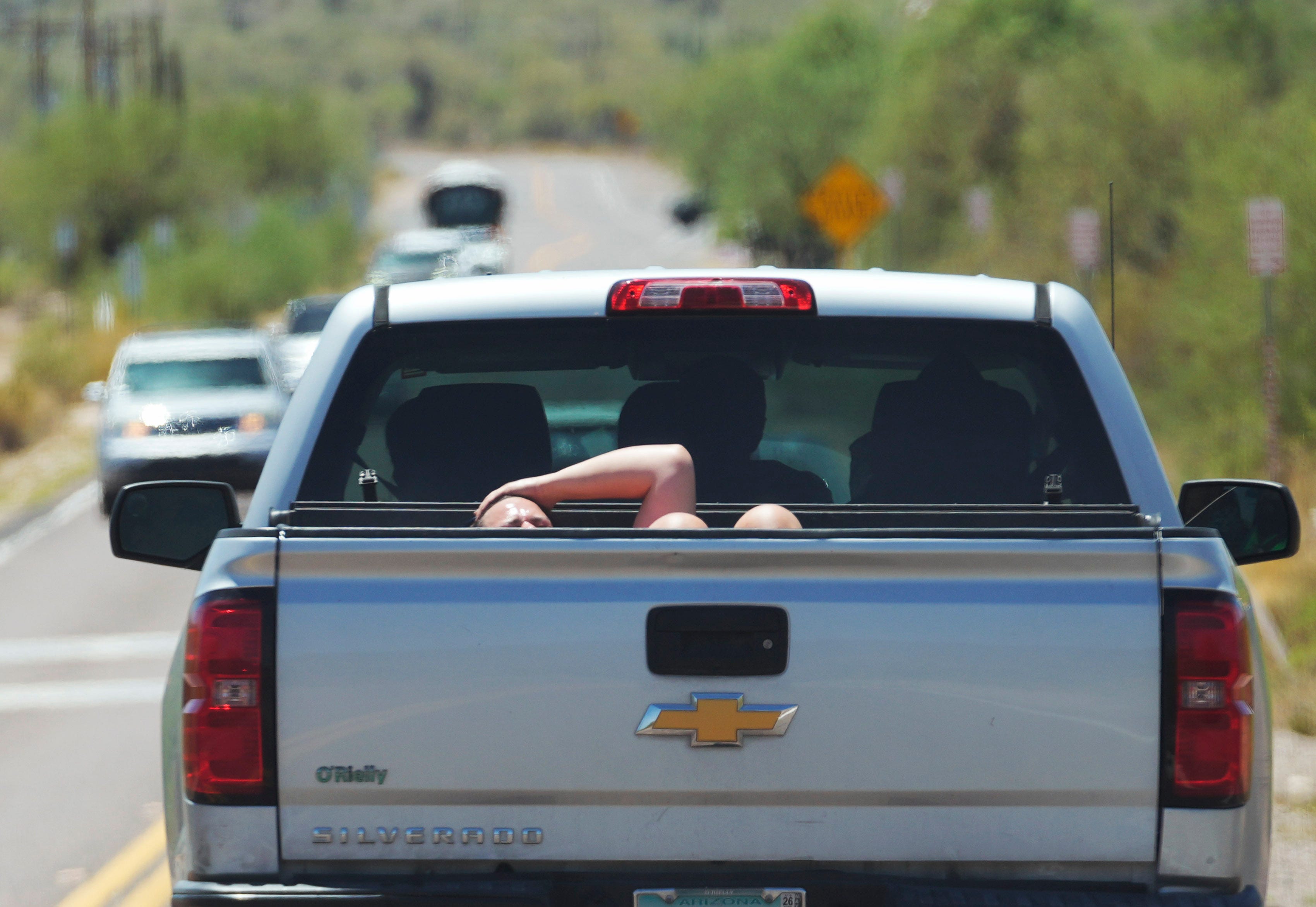 Is it illegal to ride in the bed of a truck in Arizona? Here's what the ...
