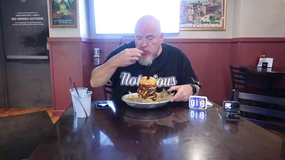 Attempting an eating challenge right next to the prettiest woman I ever saw