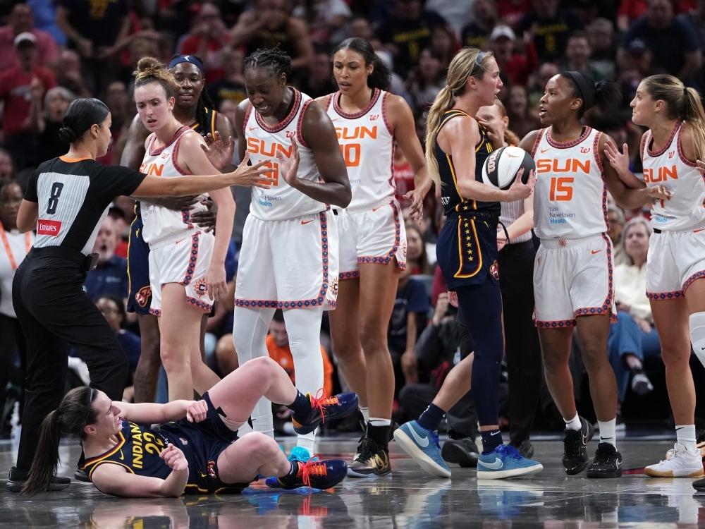 Caitlin Clark hit in face, shoved to floor during wild WNBA altercation