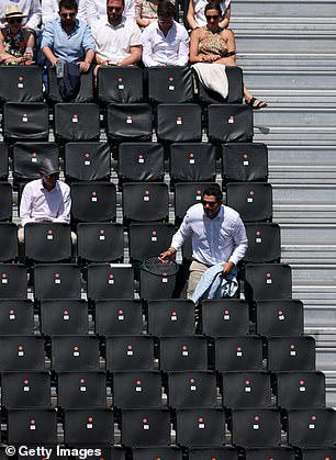Watch the shocking moment tennis player's racket almost HITS a person ...