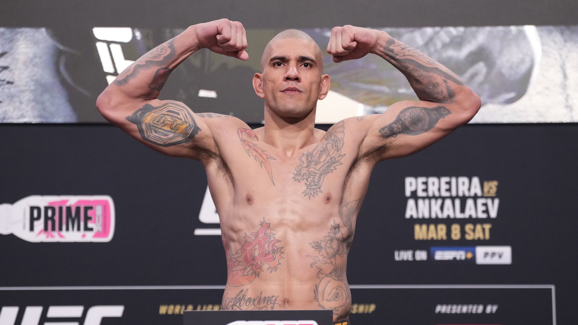 Watch Alex Pereira tip the scales at over 240 pounds