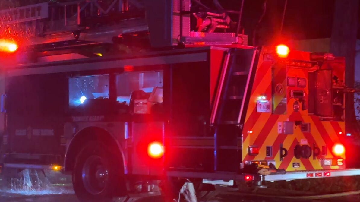 JFD investigating after home catches fire with two people inside