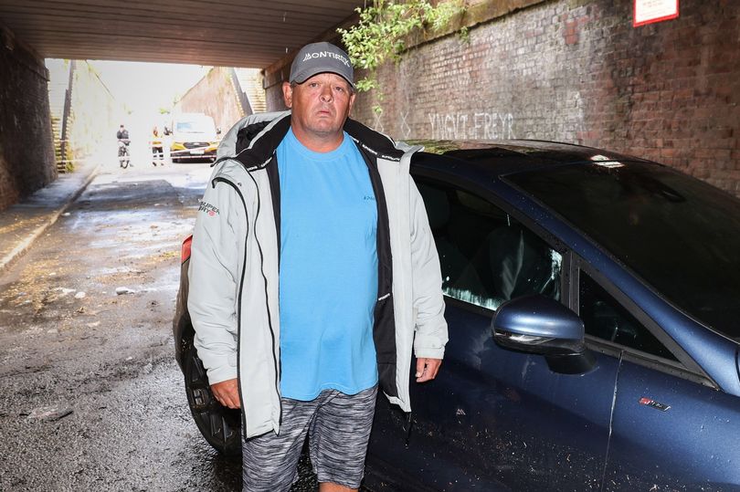 Man waded through flash flood to save baby from stranded car