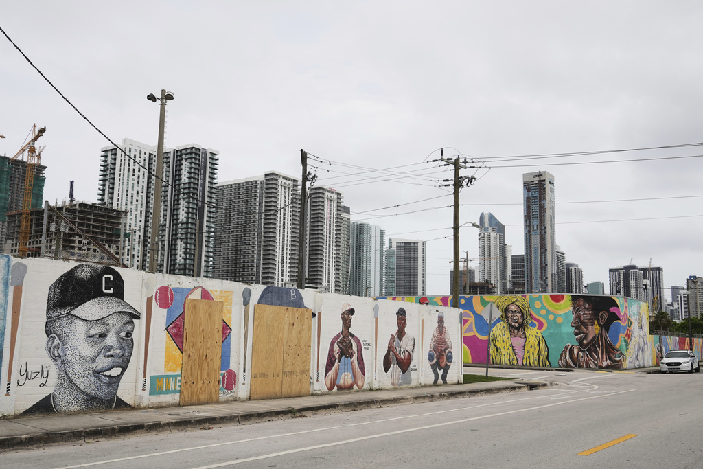 A mural honoring Jackie Robinson and Minnie Miñoso is defaced with ...