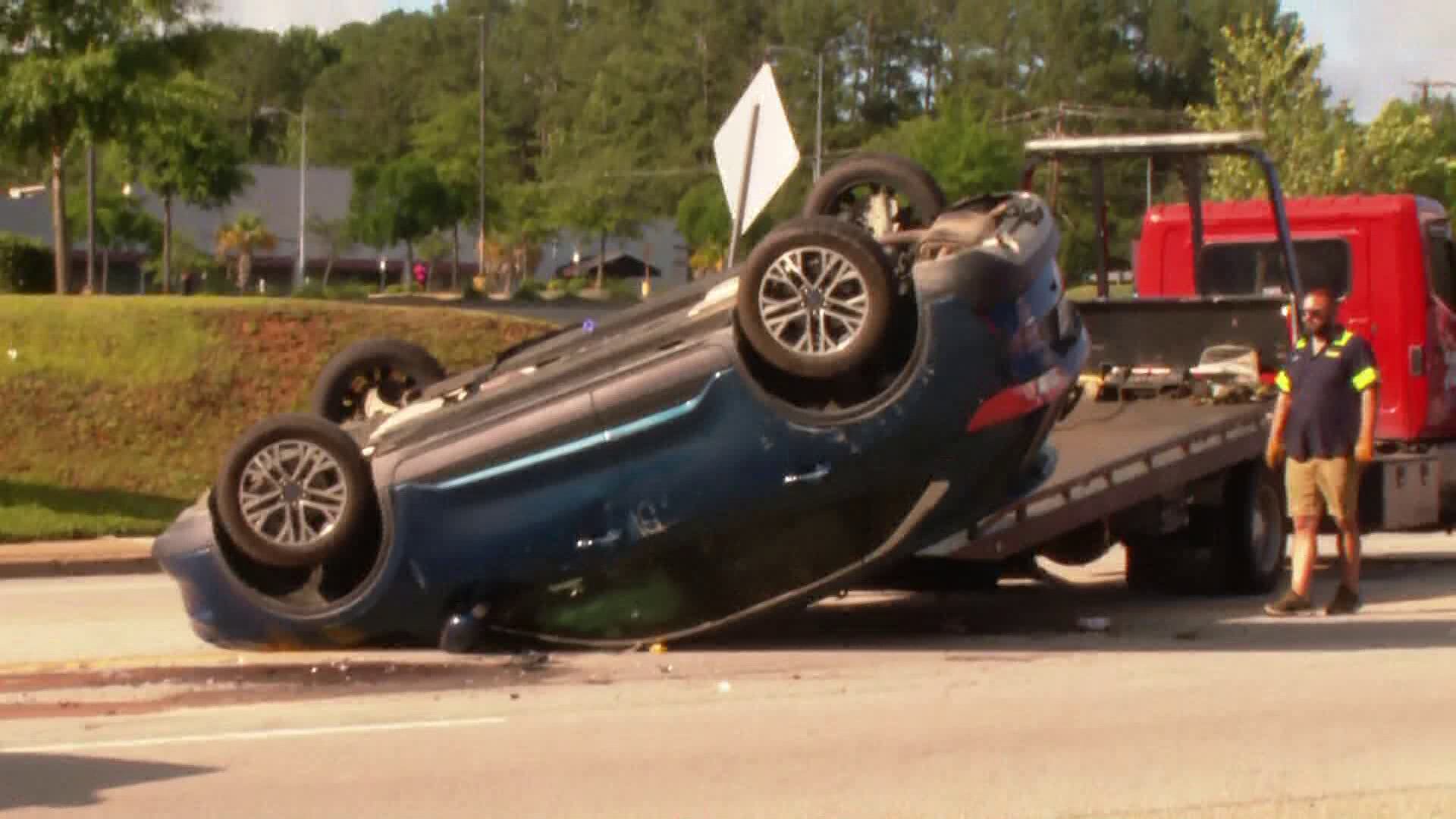 LOOK: Car flipped in crash on Bush River Road
