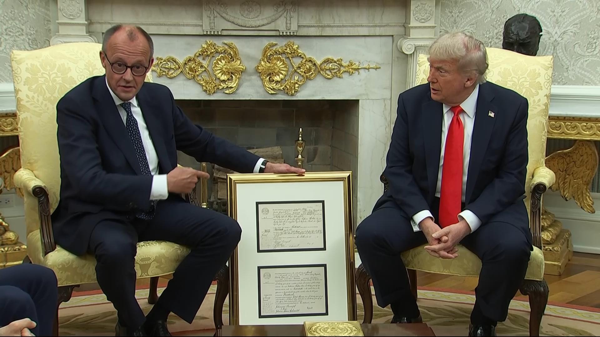 German Chancellor presents gilt-framed copy of Donald Trump's ...