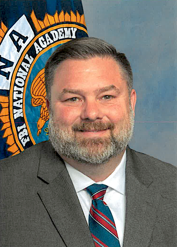 Washington police officer earns prestigious status as FBI National ...