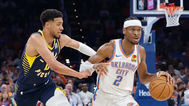 Shai Gilgeous-Alexander and Tyrese Haliburton’s dads share a courtside ...