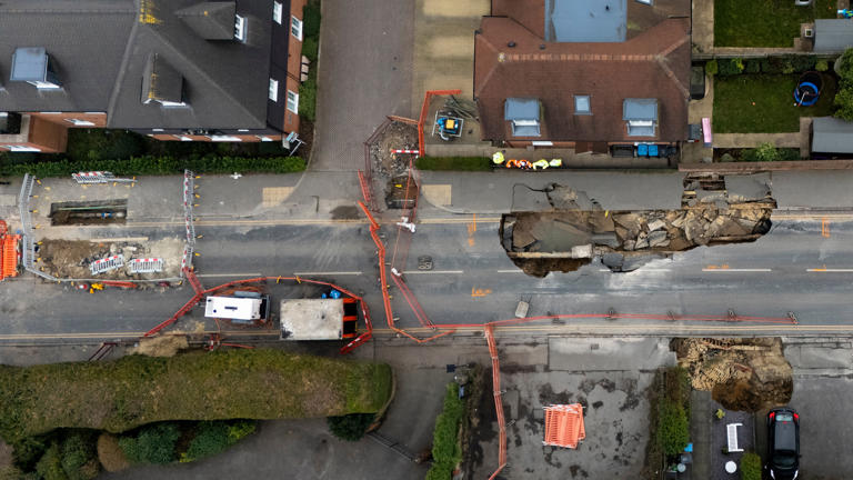 New clues over massive Surrey sinkhole after network of tunnels ...