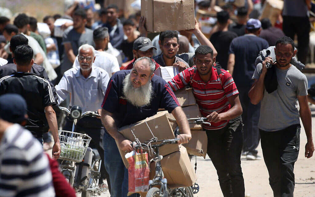 GHF says it closed sites early today due to ‘excessive crowding that ...