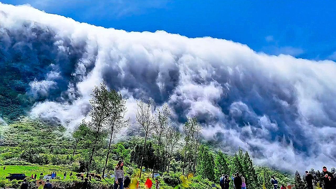 Breathtaking 'cloud waterfall' cascades down mountainside in China