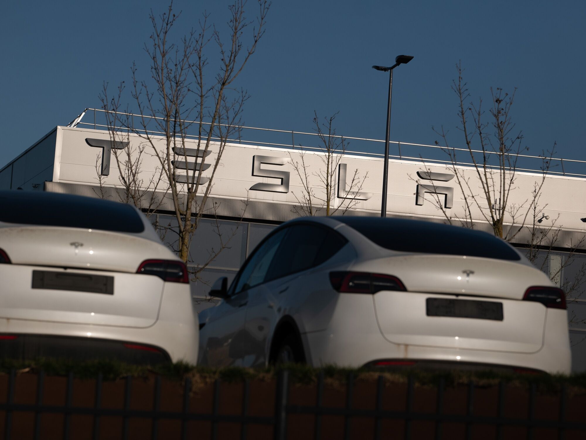 Tesla’s EV Deliveries Are Seen Falling as Demand Erodes Sharply