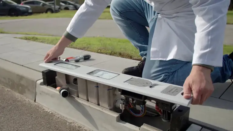 Can you find this sidewalk EV charger? It’s hiding inside the curb