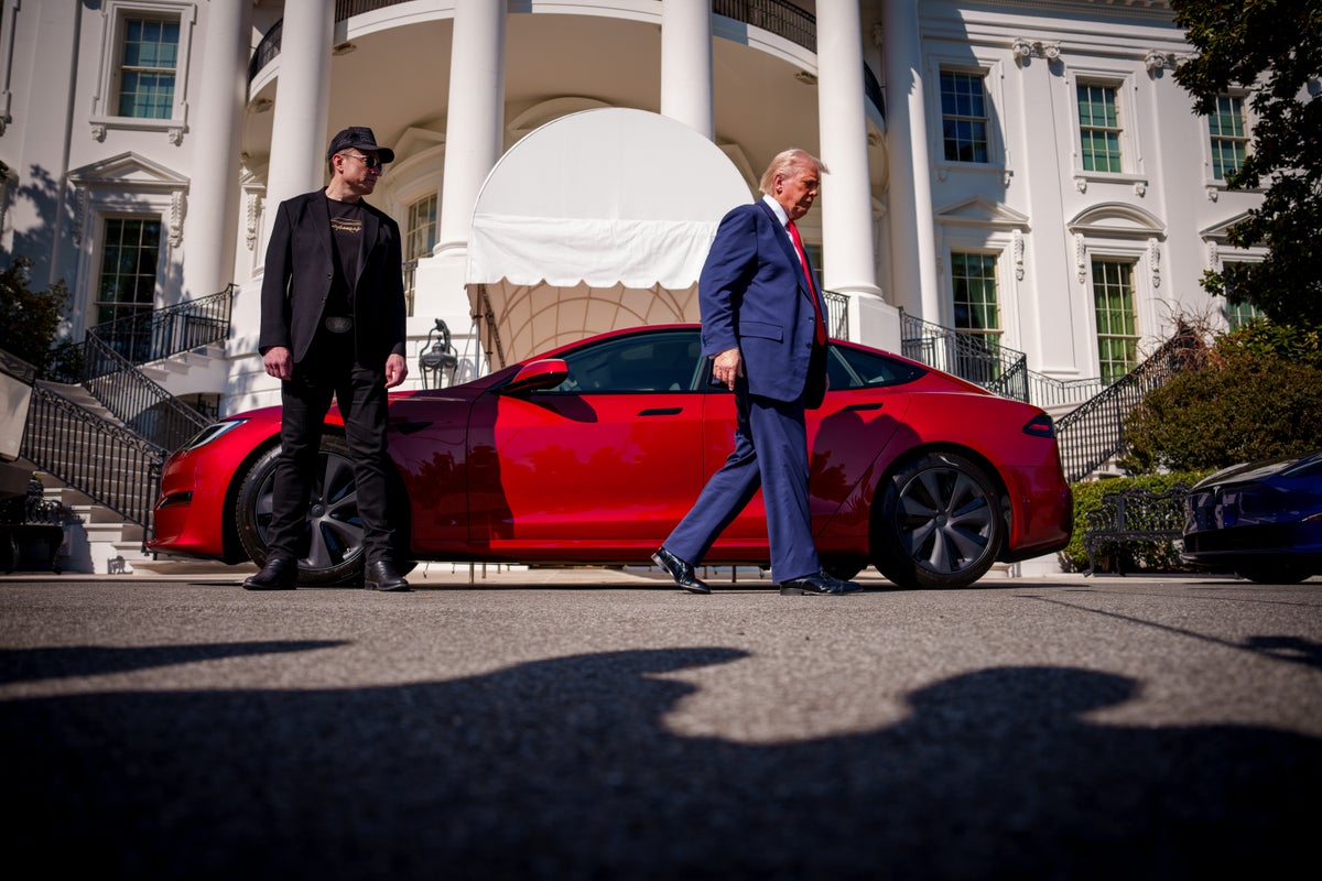 Trump looks to unload red Tesla he bought from Elon Musk in March amid ...