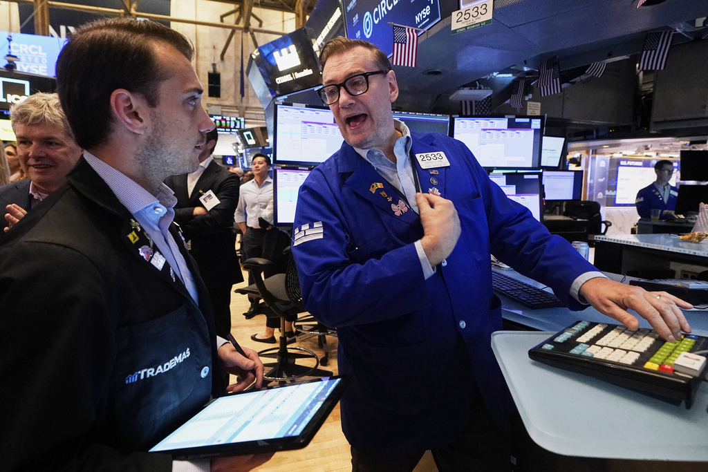 Wall Street gains ground following a solid jobs report and marks ...