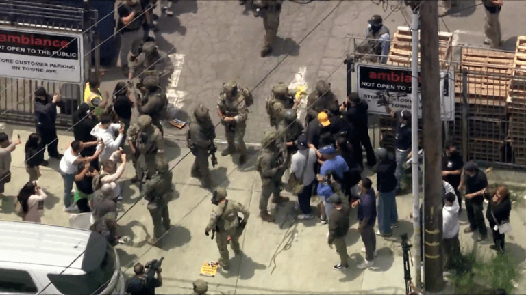 PHOTOS: Federal agents conduct immigration enforcement operation in ...