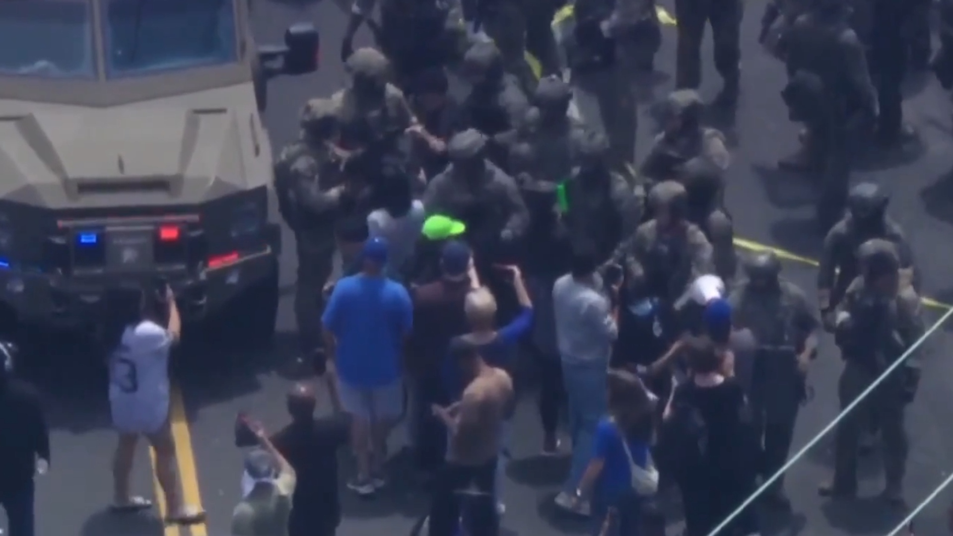 Smoke bombs thrown into crowd of protestors in LA