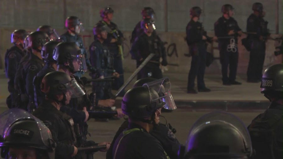 Flash-bangs, tear gas and arrests as ICE raids protests continue in Los ...
