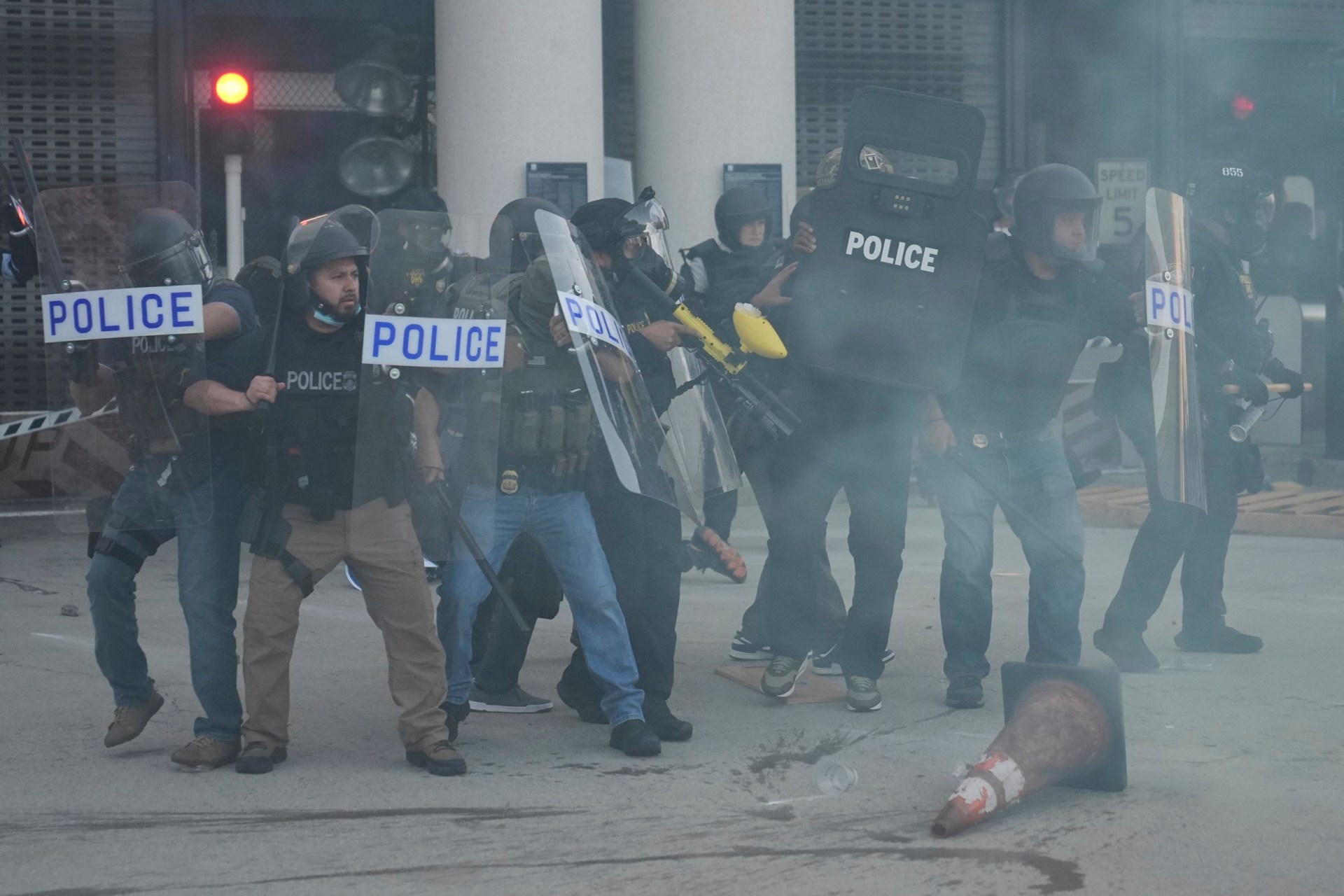 45 arrested after police pepper spray protesters outside immigration raid