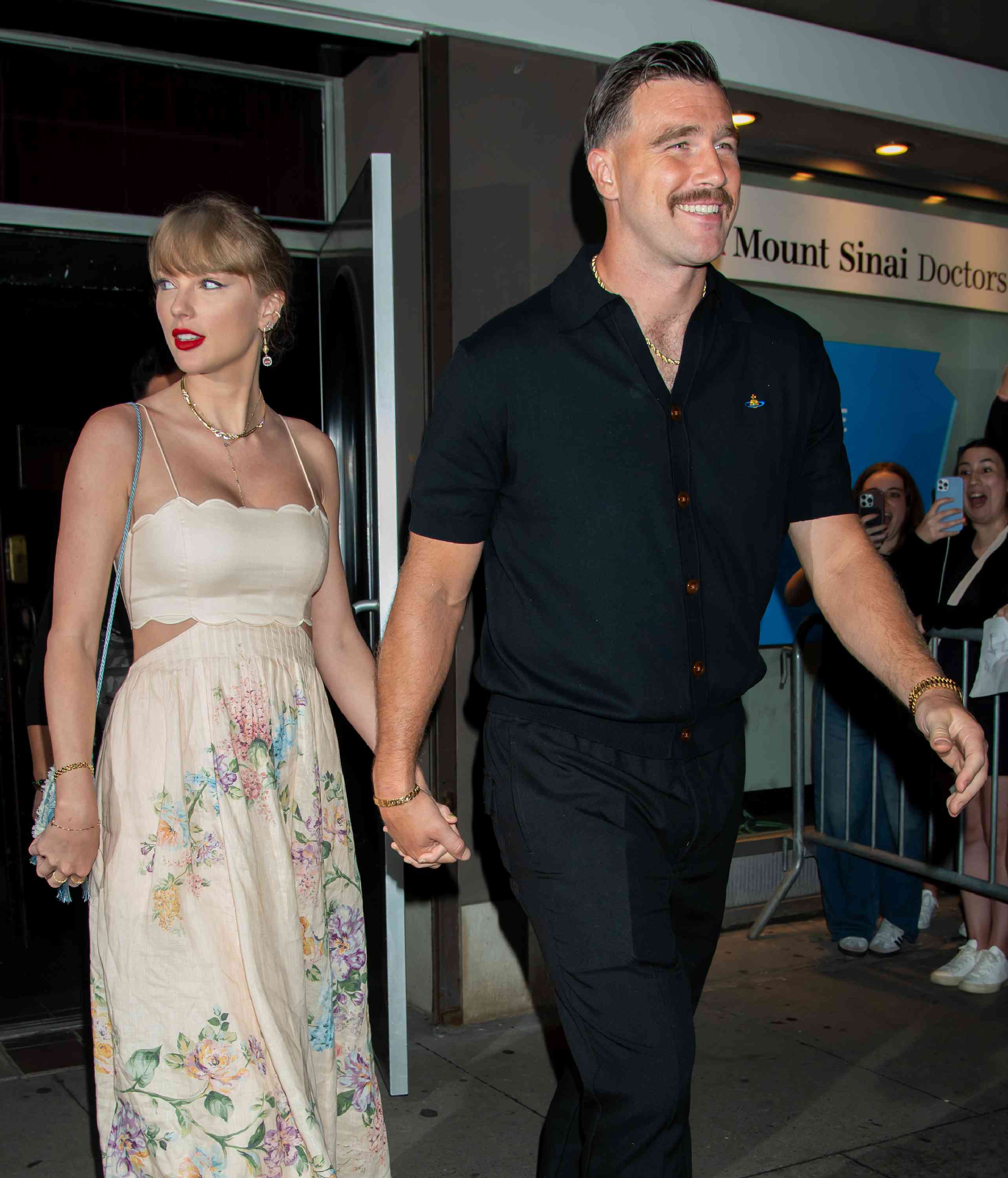 Taylor Swift Stuns in a Plunging Floral Gown with Travis Kelce at His ...