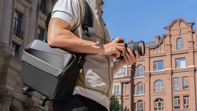 This is the world's first magnetic, zipper-free camera sling for one ...