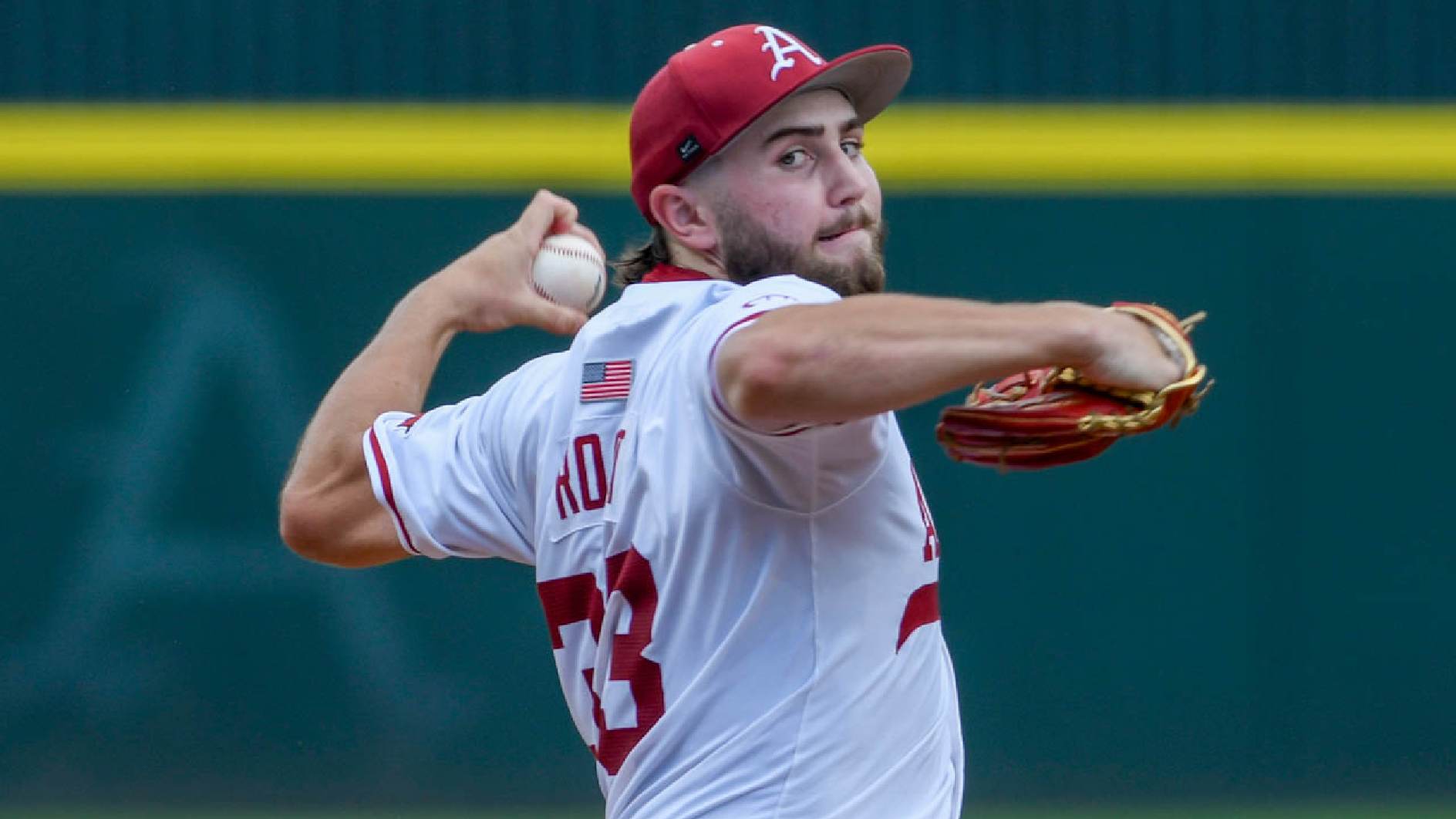 Root shines; brings Arkansas to brink of Omaha against Volunteers